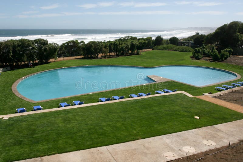 Seaside swimming pool stock photo. Image of summer, resort - 13936134