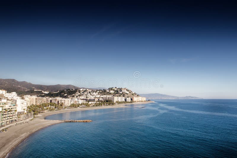 Seaside town of almunecar stock photo. Image of mountains - 143306476