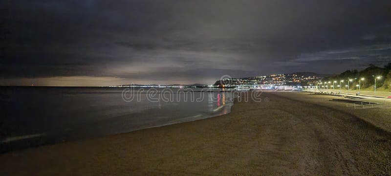 Seaside town at night stock image. Image of town, darkness - 232862251