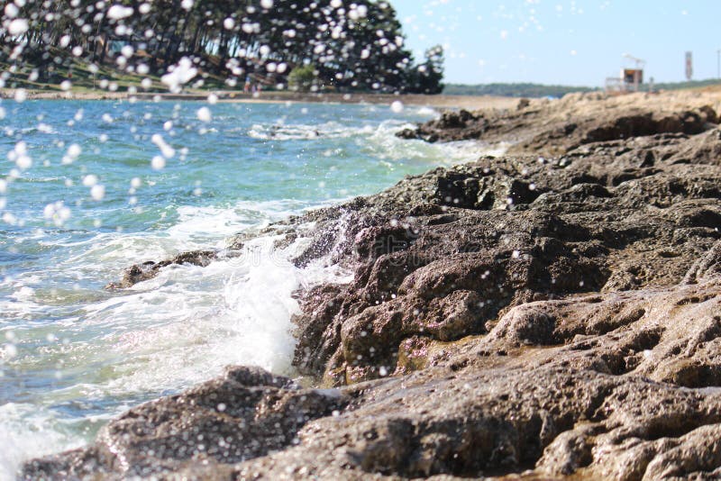 Seaside water splash stock image. Image of stone, summer - 85651655