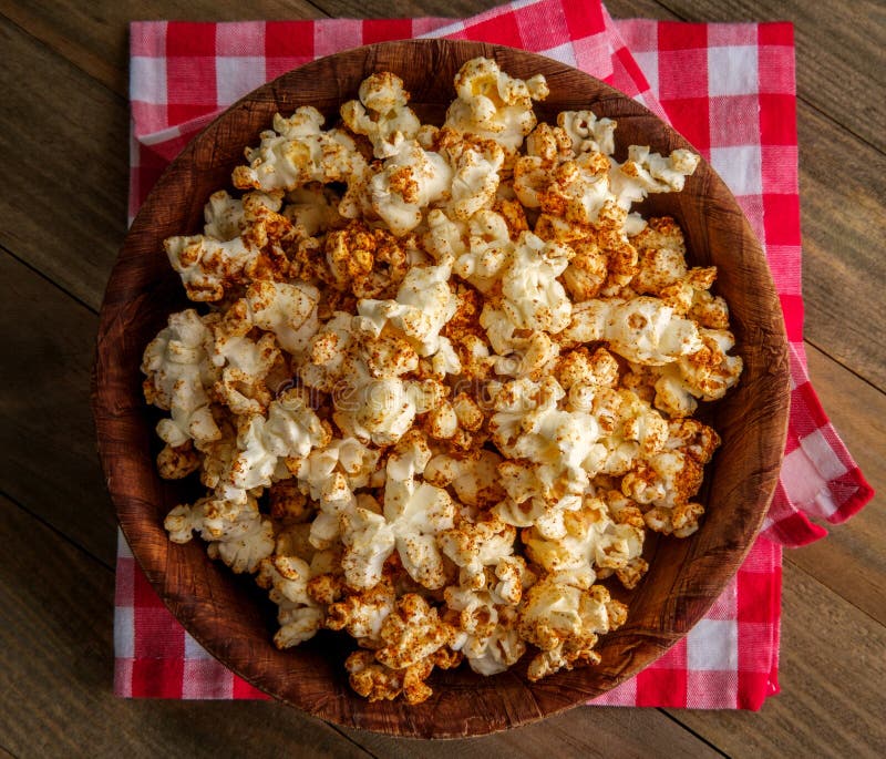 Seasoned Spicy Popcorn stock image. Image of salty, delicious - 220796481