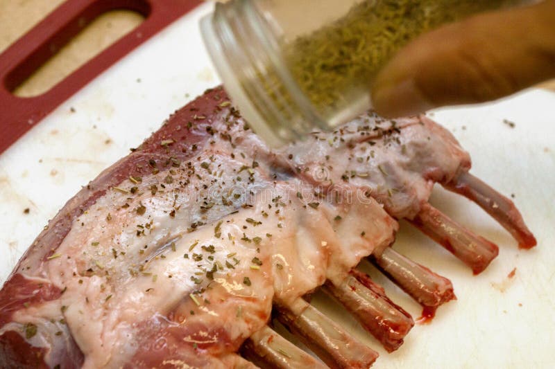 Seasoning French Rack of Lamb Stock Photo - Image of thyme, bones ...