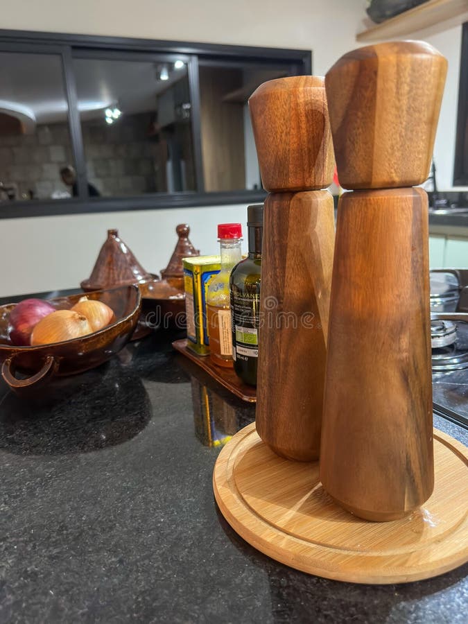 Seasonings and a Bowl of Onions on Kitchen Island Stock Image - Image ...
