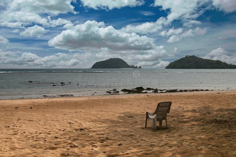 Seat at the Beach with Cloudy Sky and Island Stock Image - Image of ...