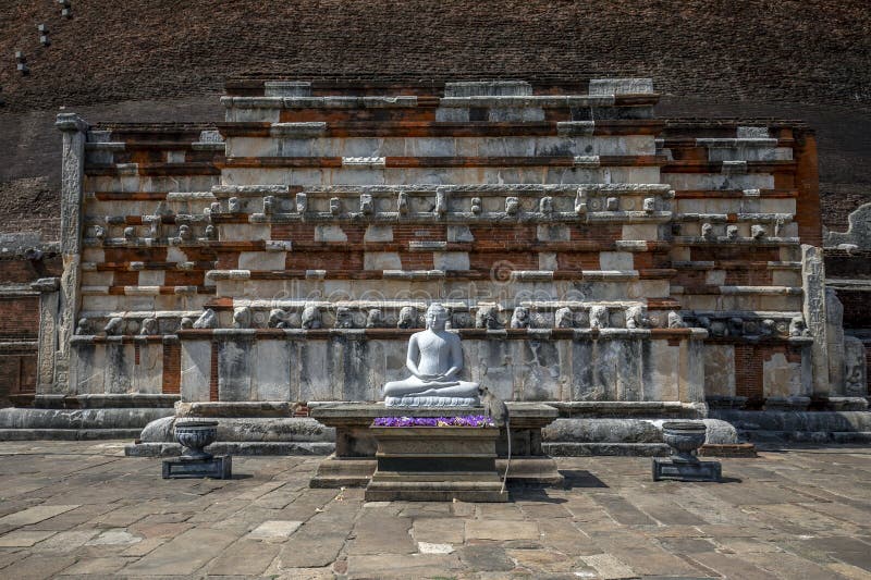 A Buddha Statue at the Base of the Jetawanaramaya Dagoba at ...