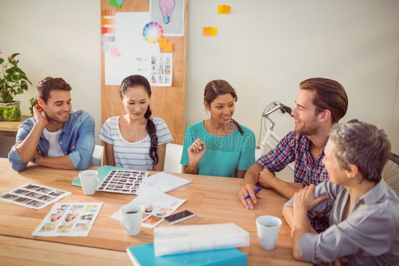 Seated Creative Business Team Working Together Stock Image - Image of ...