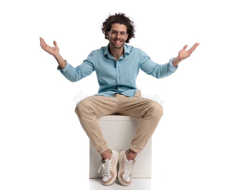 Seated Handsome Casual Man Making Welcoming Gesture Stock Photo - Image ...
