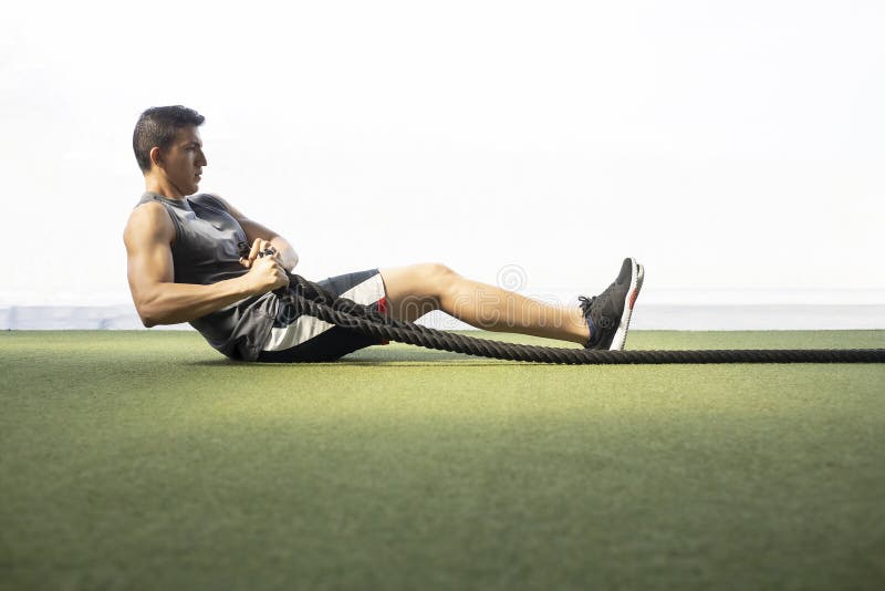 Man Exercising with Cross Fit Training Rope Stock Image - Image of ...