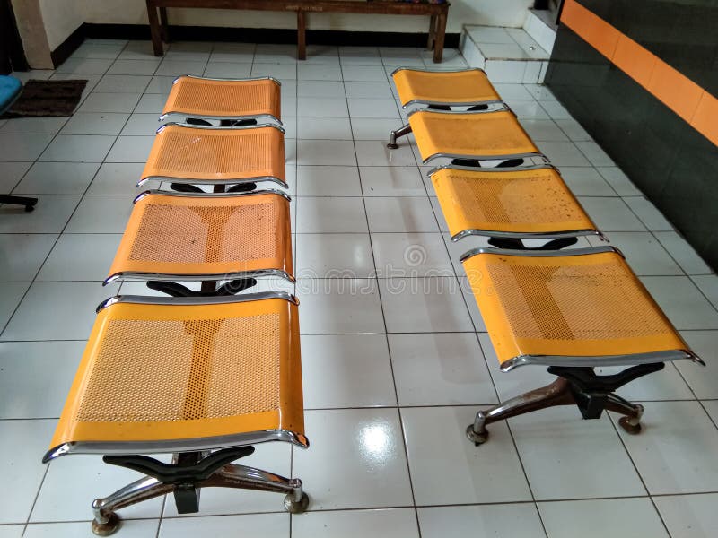 Yellow Seating for Customers Stock Image - Image of people, customer ...