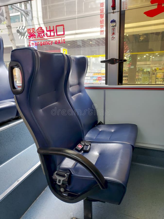 Blue seats inside a bus. stock photo. Image of bumper - 260873358