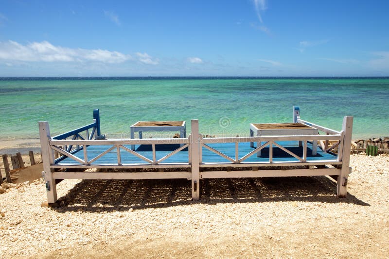 Seats on a tropical beach stock image. Image of divan - 11339525