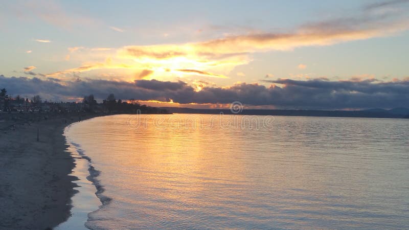 Seattle beach sunset stock image. Image of mother, view - 62371803