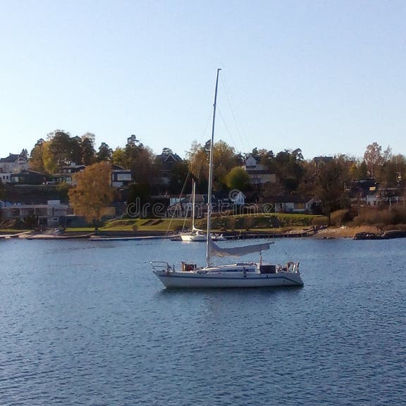Seaview and boat stock image. Image of lake, watercraft - 219888655