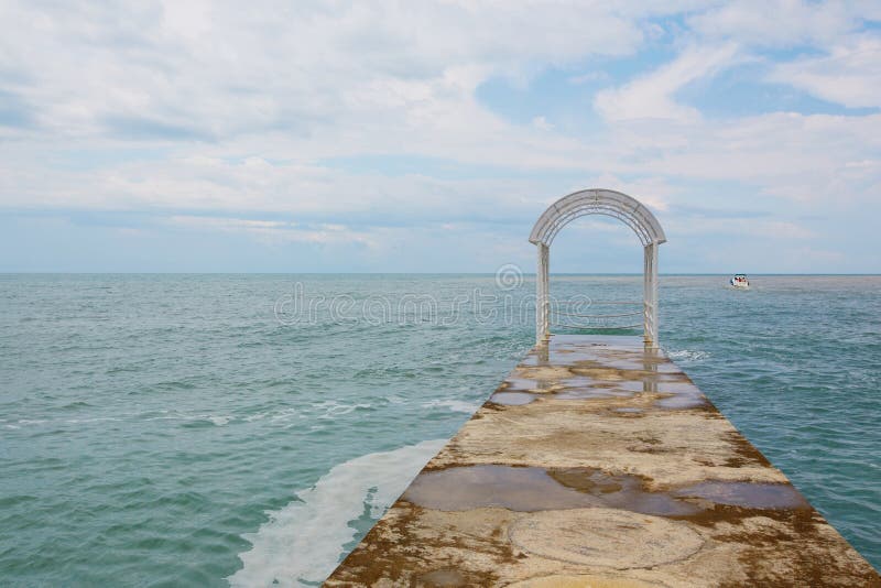 Seaview from a Pier. Look through through White Arch Stock Image ...