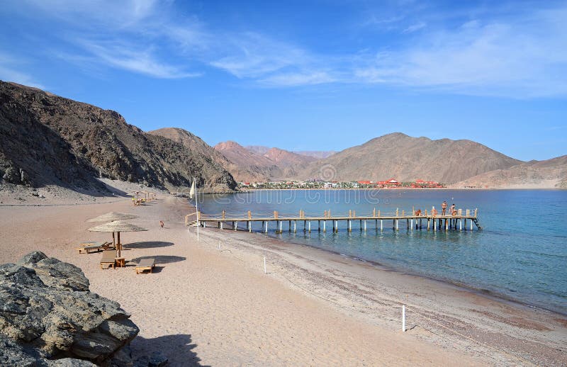 The Secluded Beach and the Gulf of Aqaba on the Background of Mo Stock ...