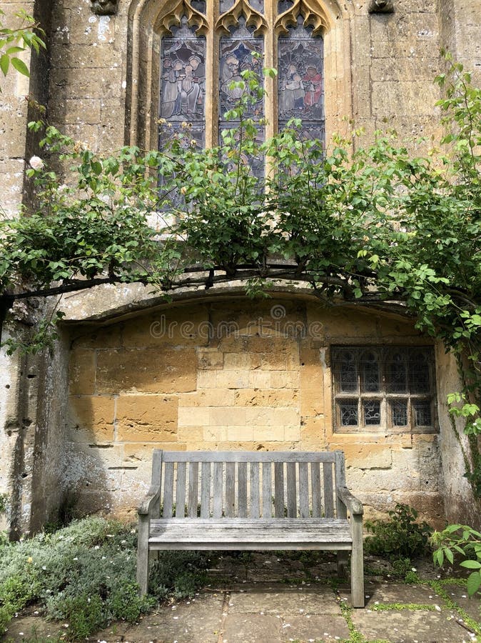 Secluded Bench Under Archway by Ancient Church Stock Image - Image of ...