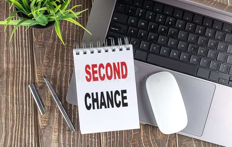 SECOND CHANCE Text on Notebook with Laptop, Mouse and Pen Stock Image ...