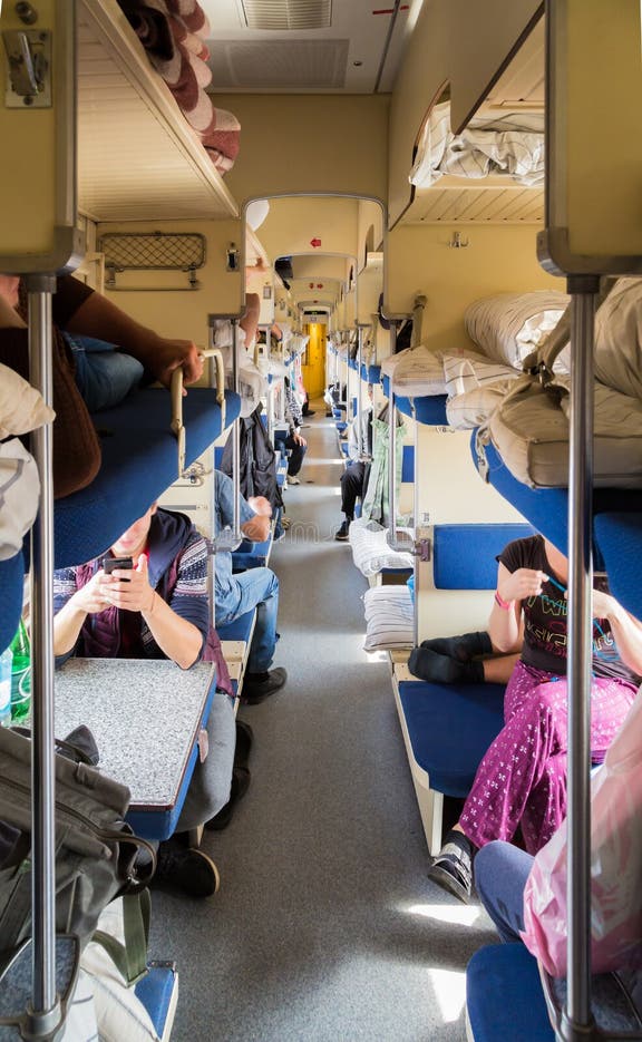 Second-class Carriage with Passengers in the Russian Train. Long ...