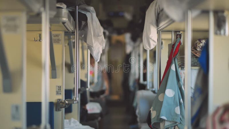 Second-class Carriage with Passengers in the Russian Train. Long ...