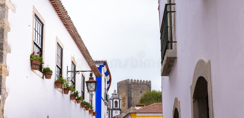 Second Floor Windows with Flower Pots Stock Image - Image of ...
