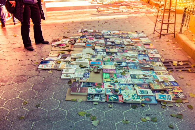 Second Hand Books for Sale Laying on the Ground Editorial Image - Image ...