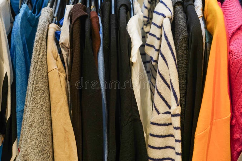 Second Hand Store with Colorful Clothes. Garage Sale Stock Image ...