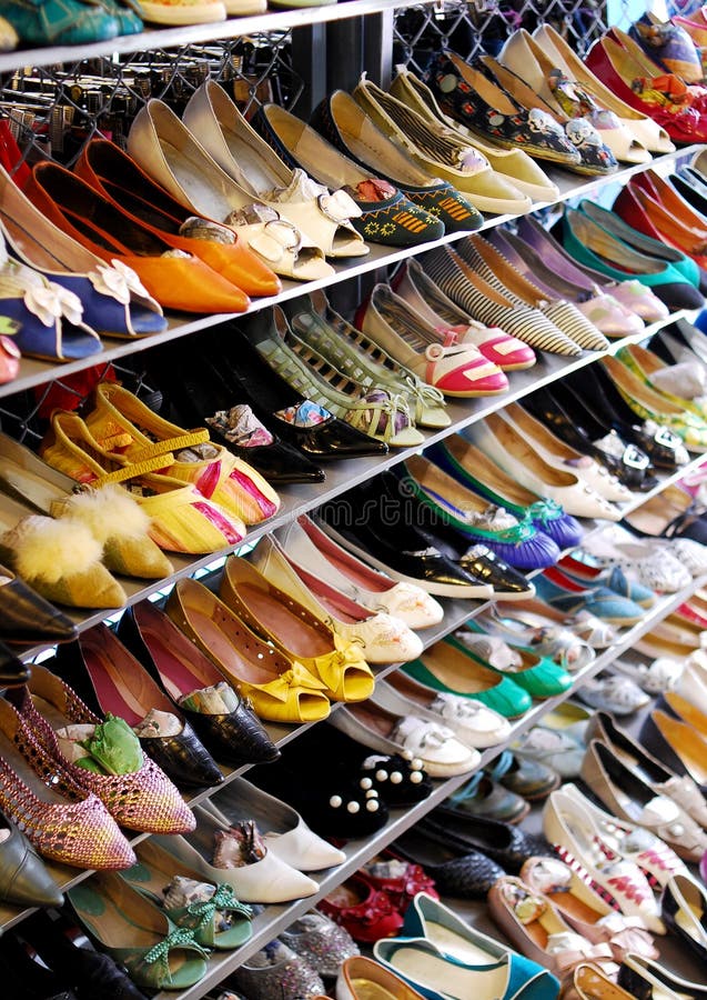 Woman shoes on sale stock image. Image of hand, market - 103943781