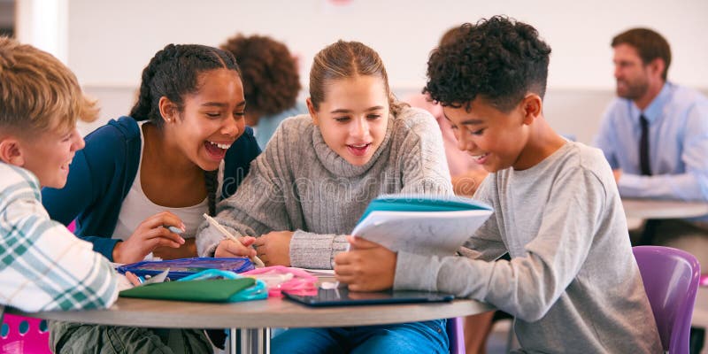 Secondary or High School Students Collaborating in Study Area with ...