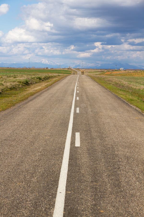 Secondary Highway with Mountains in the Background Stock Photo - Image ...