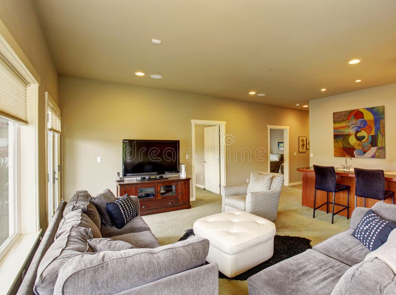 Secondary Living Room with Carpet and Bar with Stools. Stock Photo ...