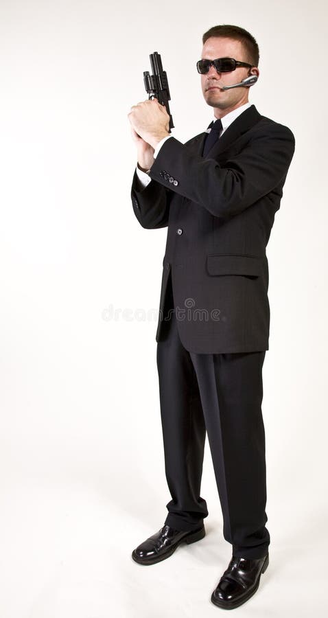 Secret Agent Armed and Dangerous Stock Photo - Image of armed, glasses ...