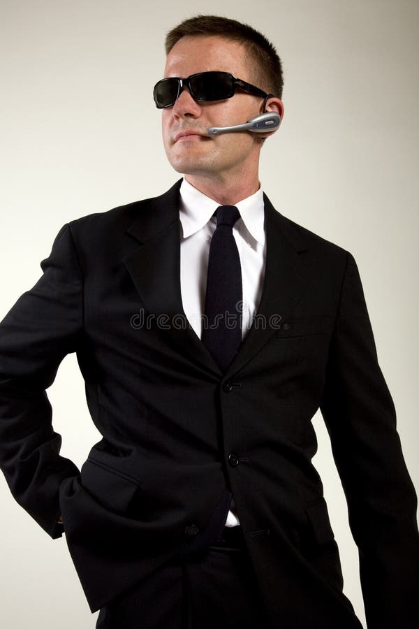 Secret Agent Listening stock photo. Image of fashionable - 5763172