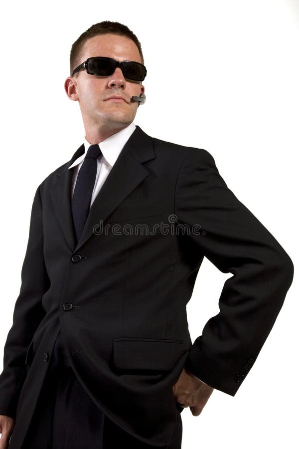 Secret Agent Reaches for Gun Stock Photo - Image of fashion, agent: 6795204