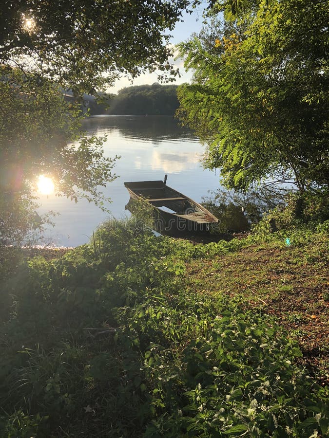 Secret boat on pond stock photo. Image of ocean, blue - 213204748