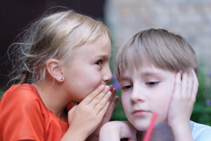 Secret Children`s Conversation Stock Photo - Image of blurry, childrens ...
