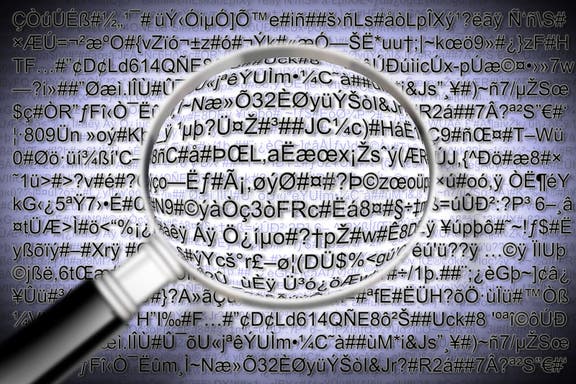 Secret Code File Concept with Magnifying Glass - the Code is Com Stock ...