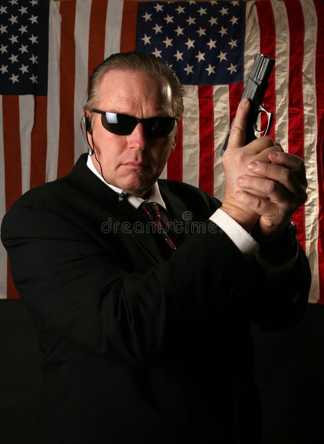 Secret service agent stock image. Image of pistol, police - 4593441