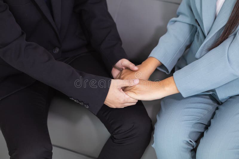 The Secretary Holds the Manager S Hand To Comfort Him during a Work ...