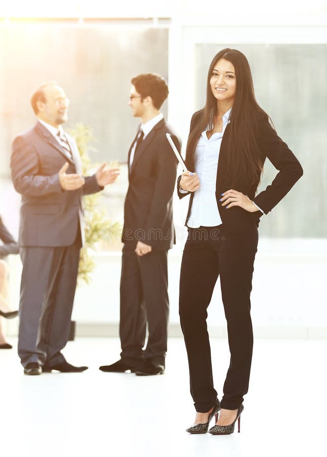The Secretary in the Office on the Background of Business Team Stock ...