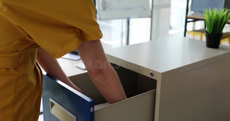 Secretary Puts Stack of Project Documents into Desk Drawer Stock Video ...
