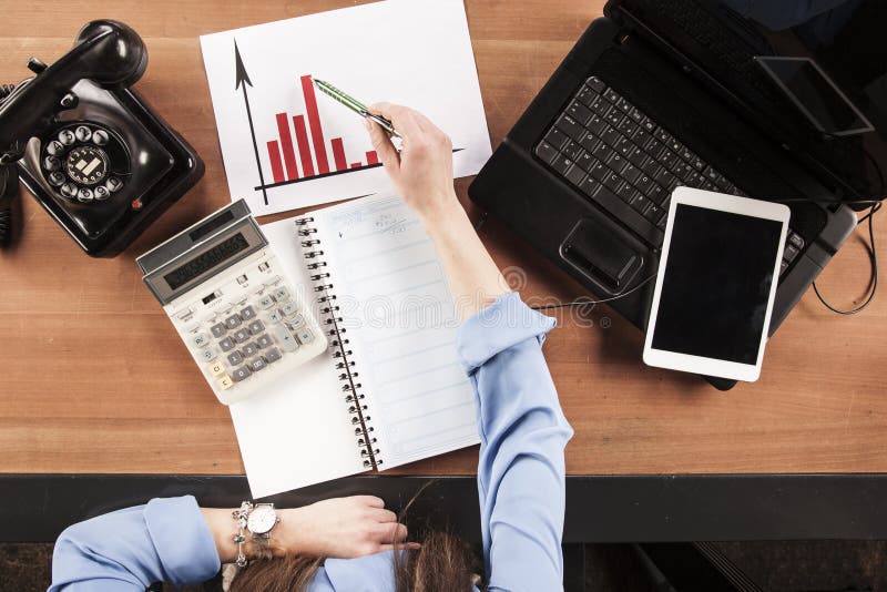 Secretary Shows the Increase on the Chart, Top View on the Desk Stock ...