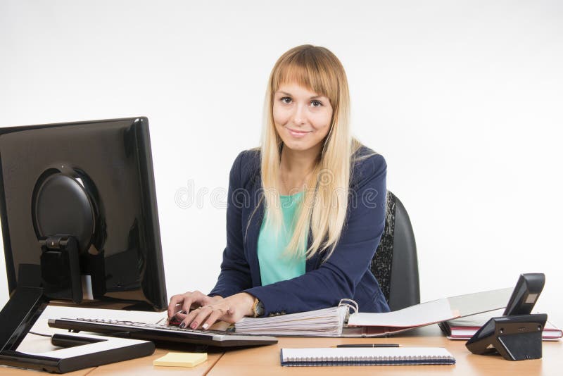 Secretary Working in the Computer, Close the Folder with the Documents ...