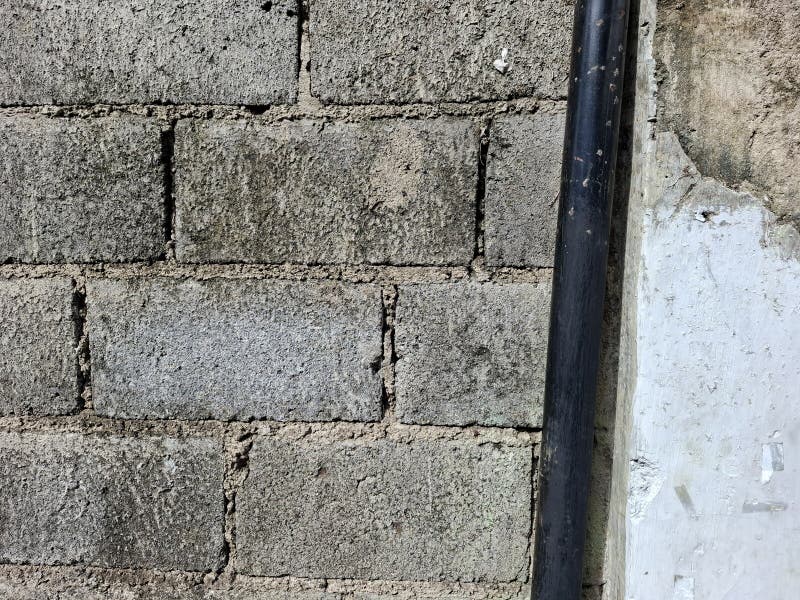 Textured Concrete Blocks with Vertical Pipe Stock Photo - Image of tile ...