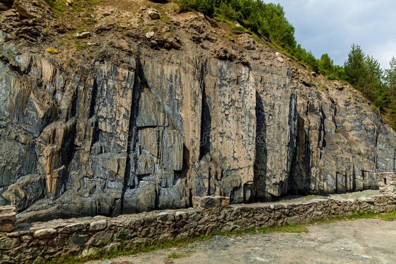 A Section of a Mountain with Visible Layers Stock Photo - Image of ...