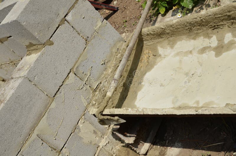 The Section of the Unfinished Wall and Iron Pan for Cement Mortar ...