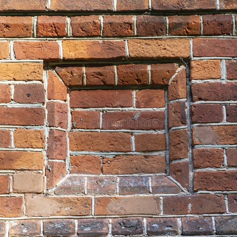 A Section of a Brick Wall with a Frame Stock Photo - Image of building ...