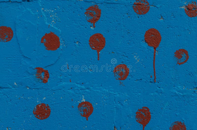 The Section of the Wall, Painted with Blue Paint with Burgundy Patches ...