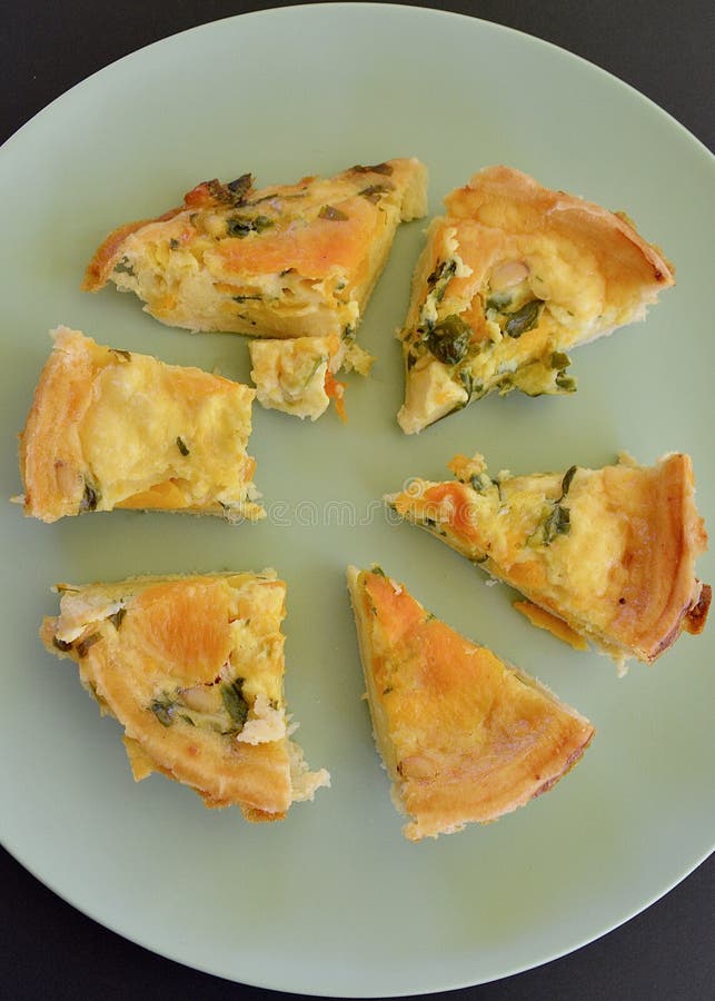 Sections of a Quiche on a Plate Stock Photo - Image of lunch, vegetable ...