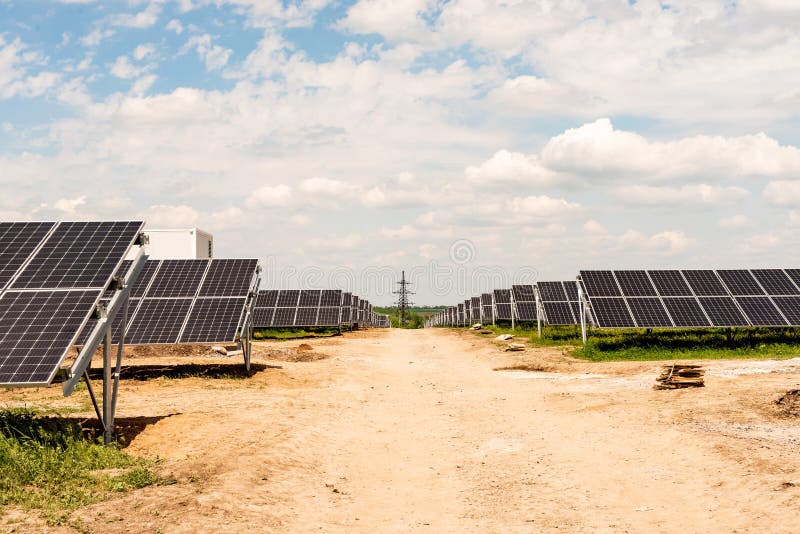 Sections of Solar Panels and a Trench with a Laid High-voltage Cable ...