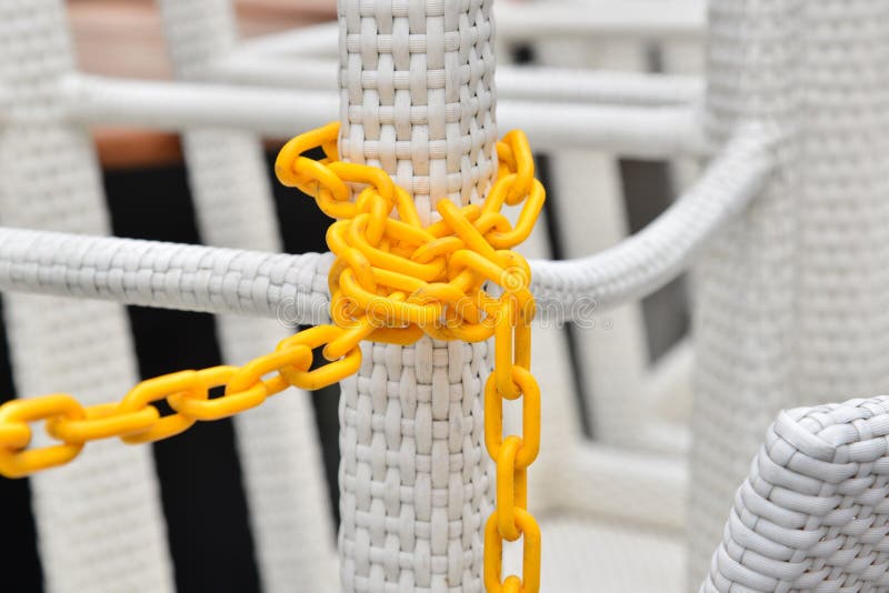 Secure chain lock stock image. Image of yellow, chair - 77787589